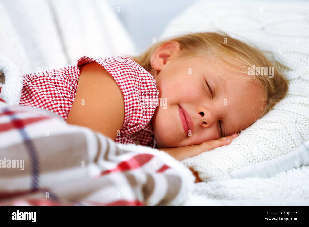 Sleeping little girl closeup Stock Photo - Alamy
