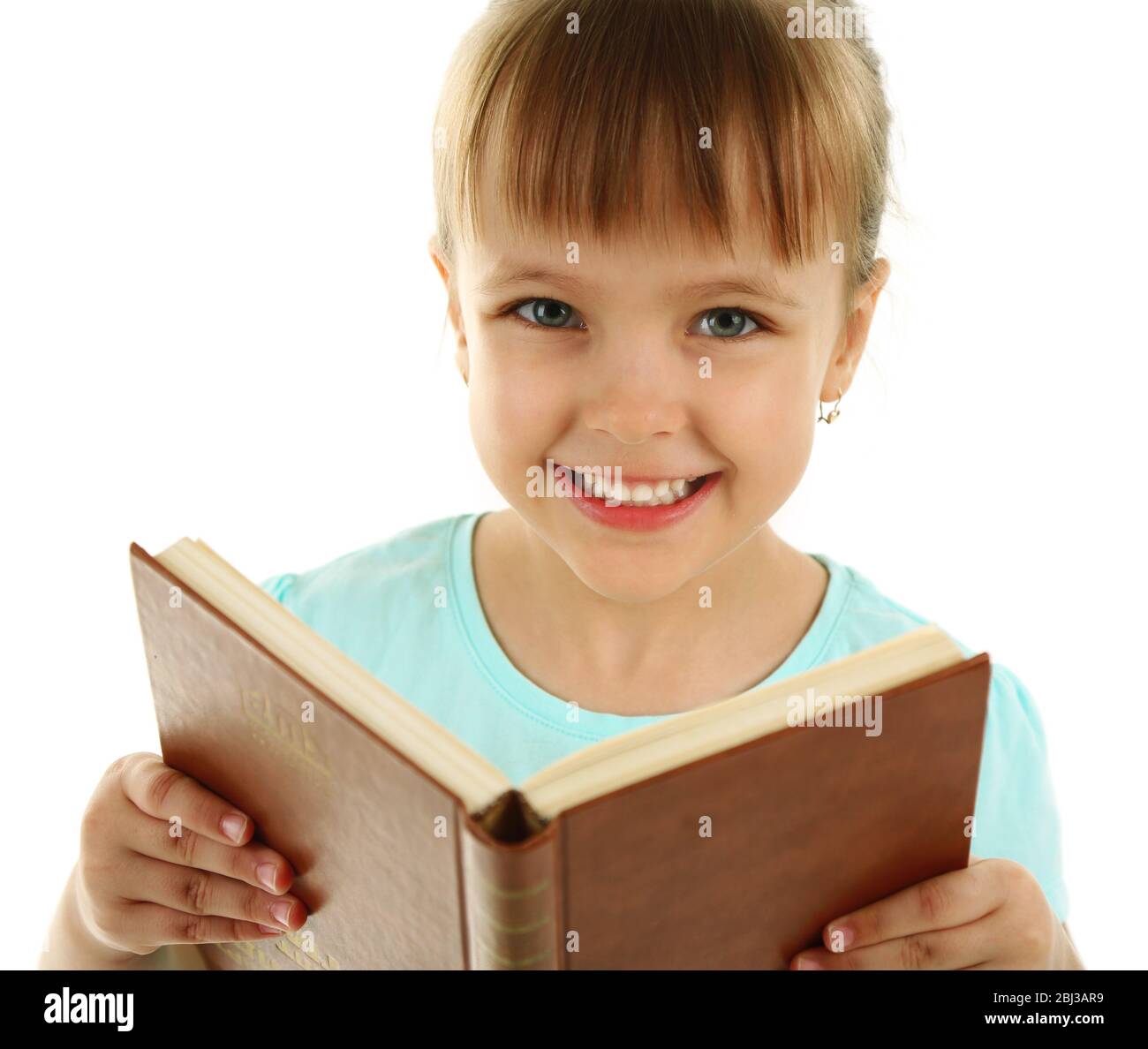 Beautiful little girl with book, isolated on white Stock Photo - Alamy