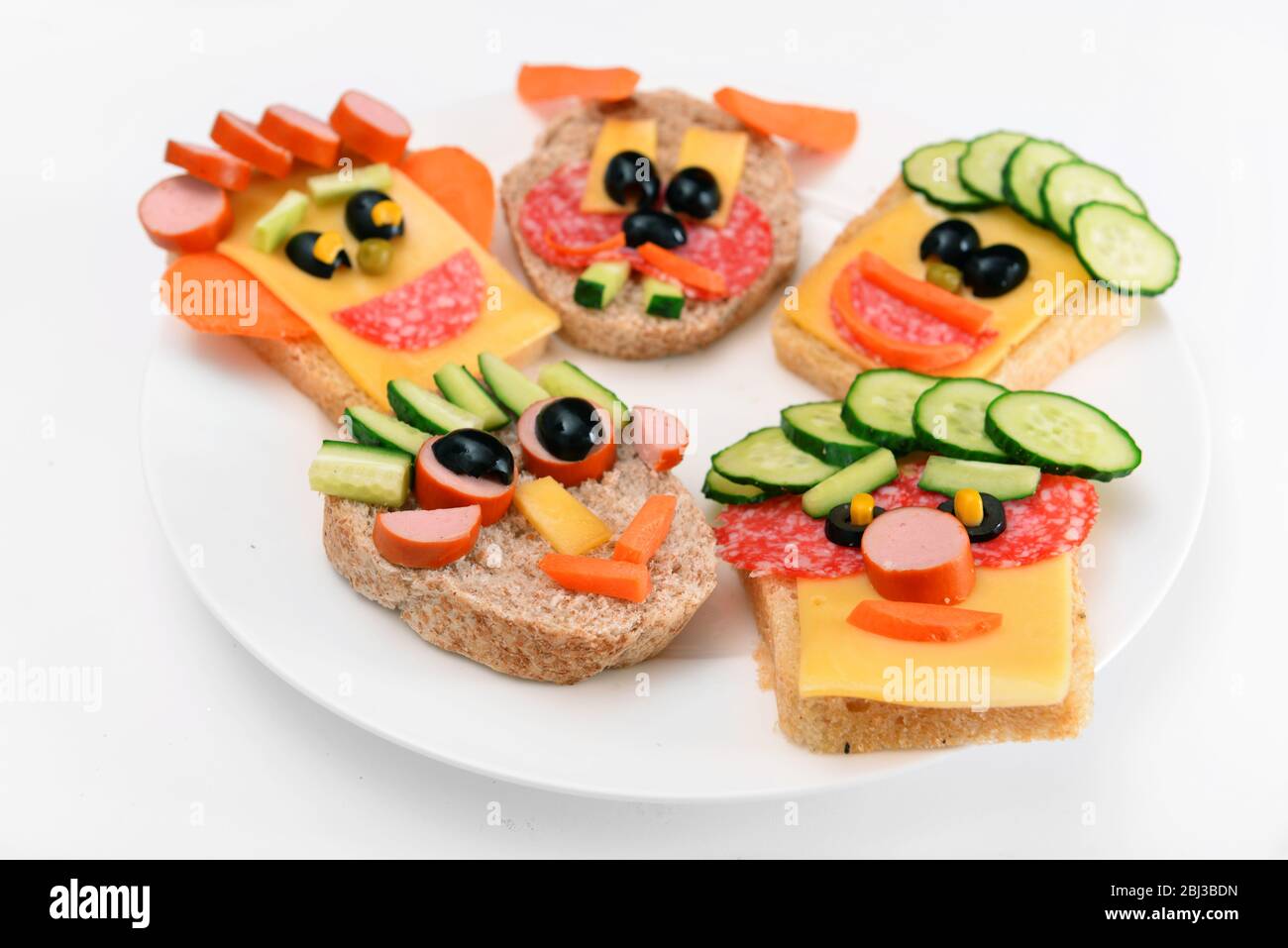 Funny sandwiches isolated on white Stock Photo - Alamy