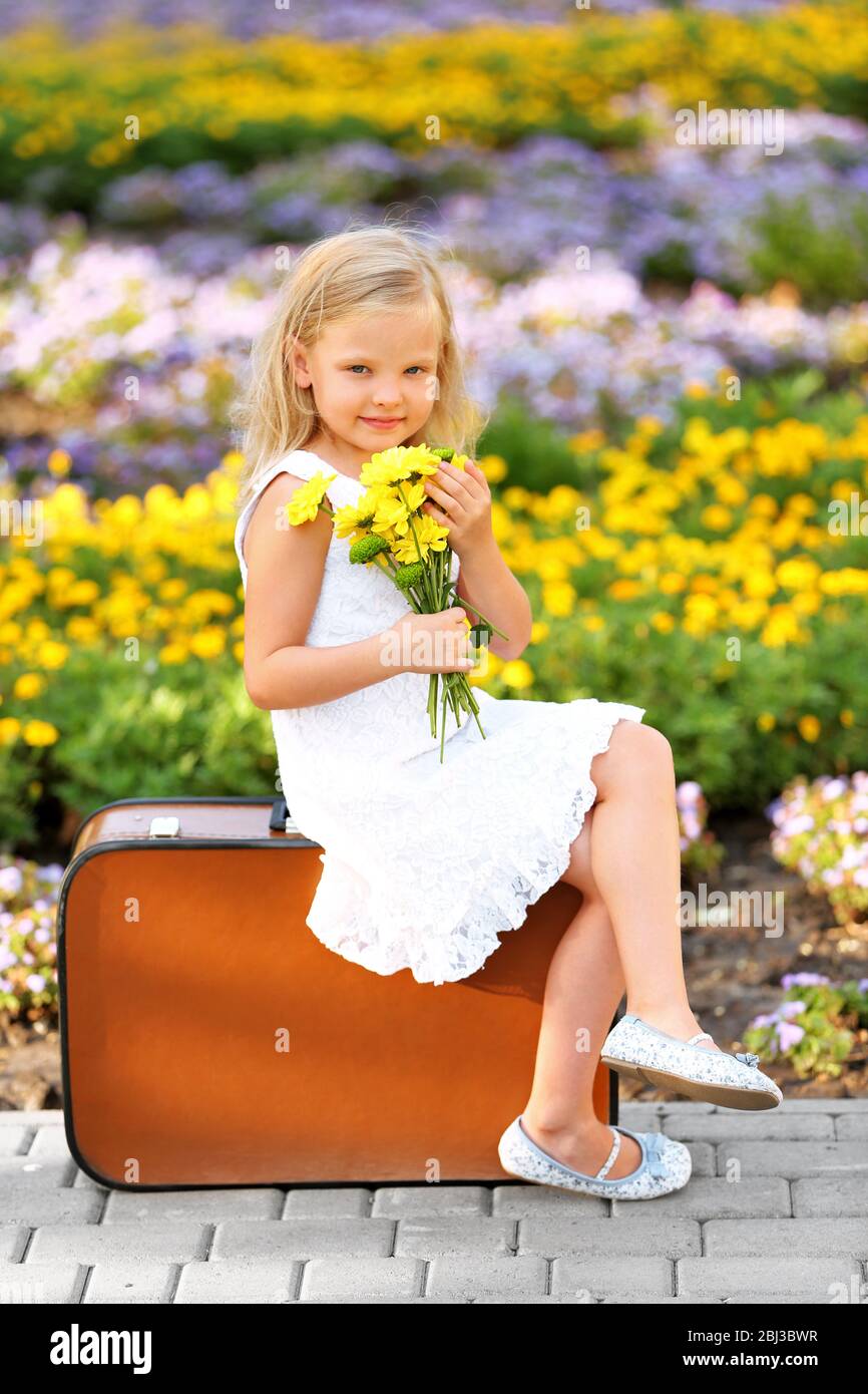 Happy girl walking in park Stock Photo - Alamy