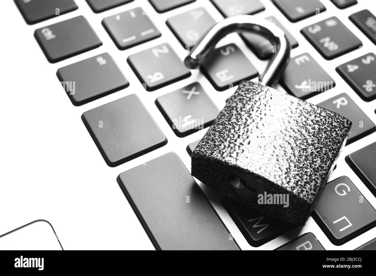 Lock on the laptop keyboard background, close up Stock Photo - Alamy