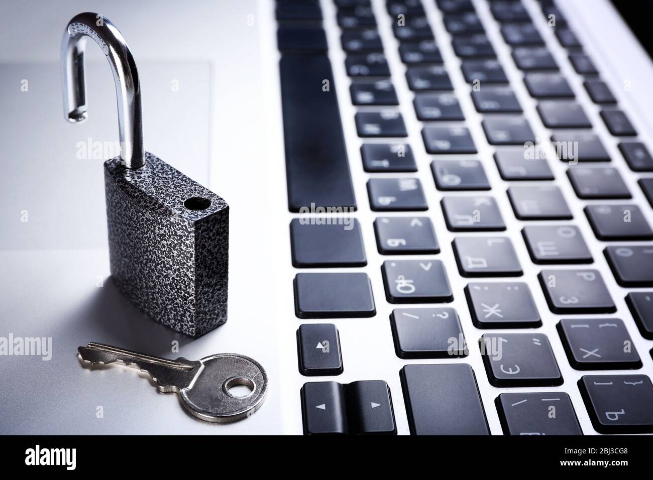 Lock on the laptop keyboard background, close up Stock Photo - Alamy