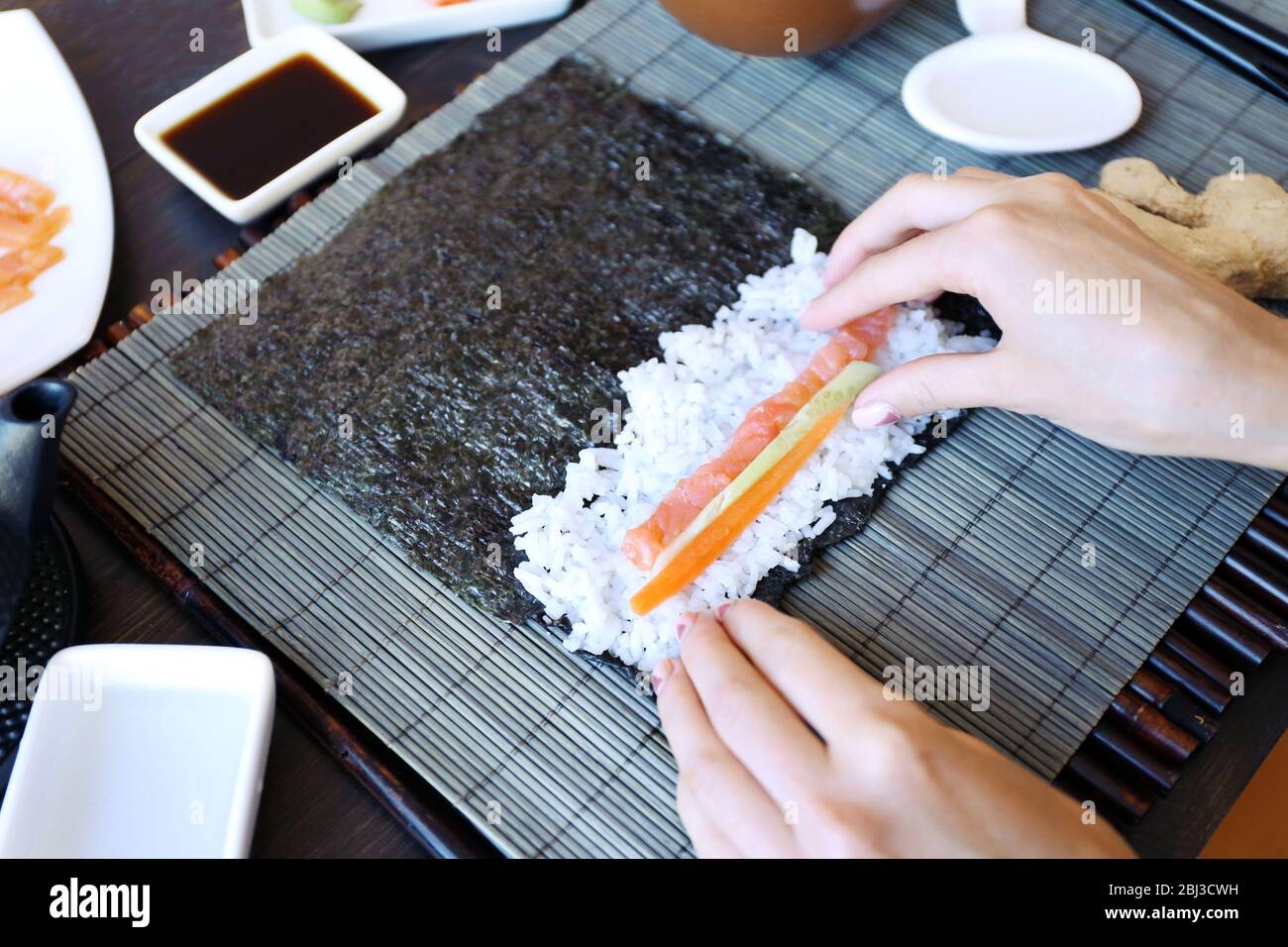The process of making sushi and rolls Stock Photo - Alamy