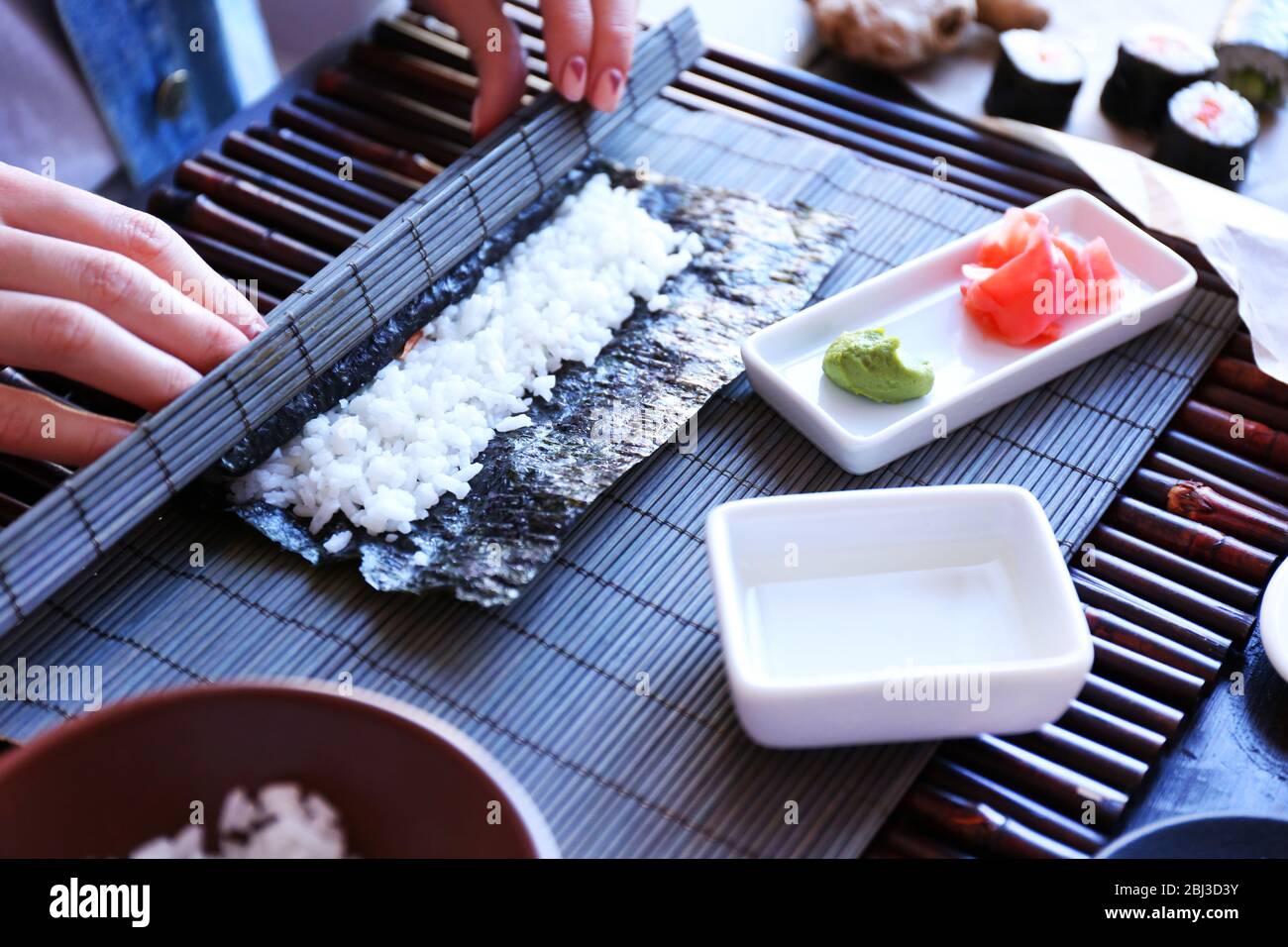 The process of making sushi and rolls Stock Photo - Alamy