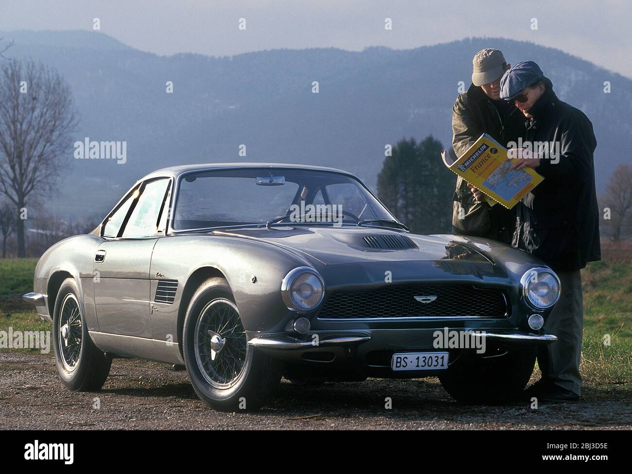 Drivers looking at a map.1960 Aston Martin DB4 Bertone Jet Stock Photo ...