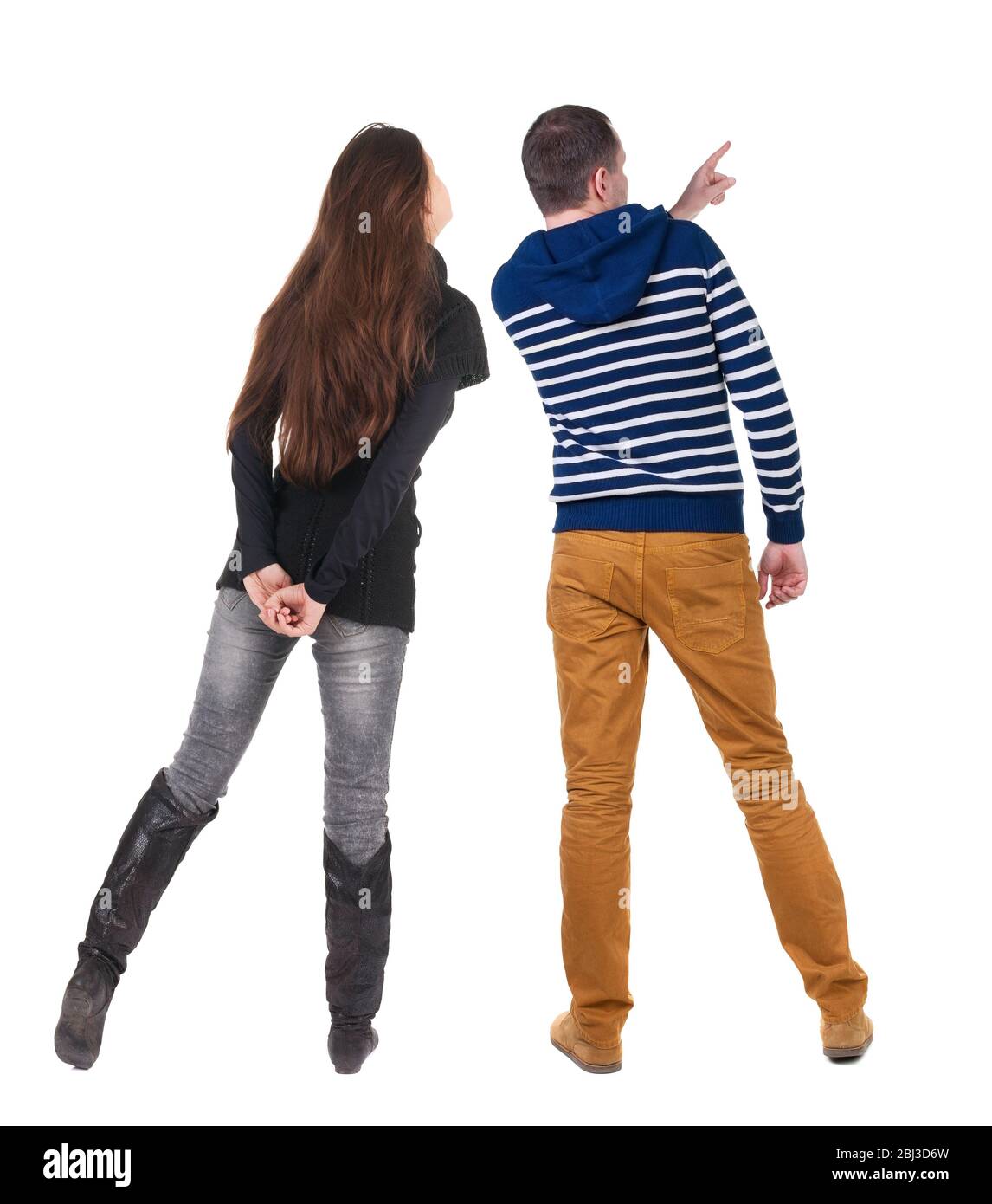 Back view of couple in sweater pointing. Rear view people collection ...