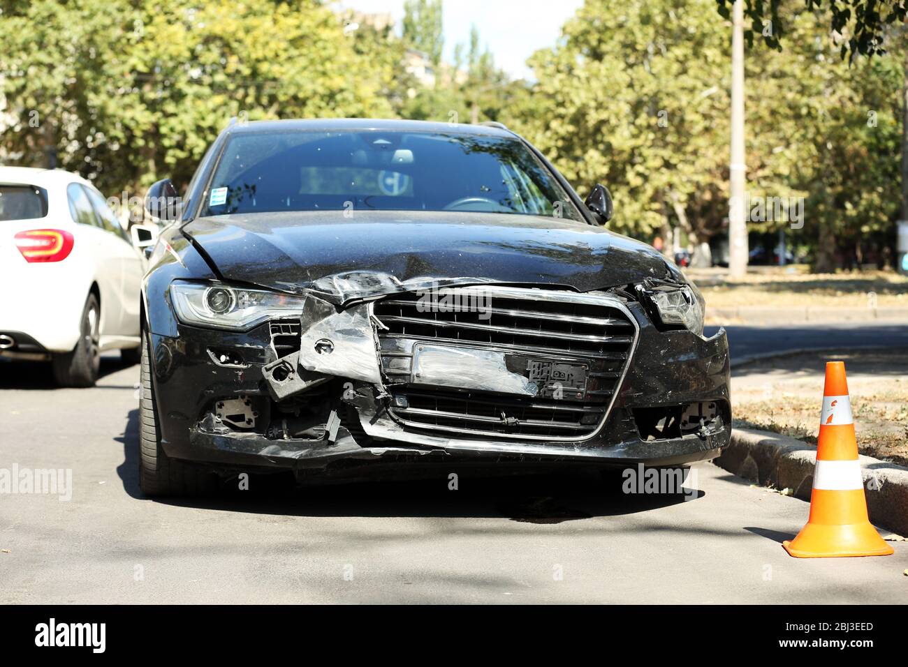 Broken car on the road Stock Photo - Alamy