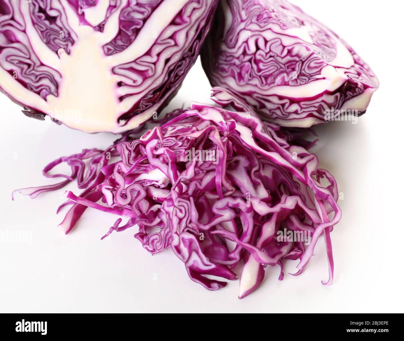 Cut red cabbage isolated on white Stock Photo - Alamy