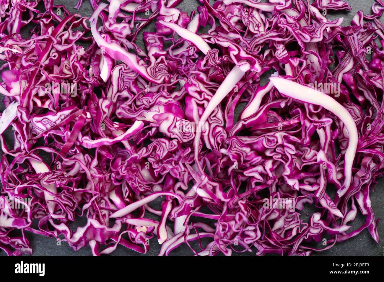 Cut red cabbage closeup Stock Photo - Alamy