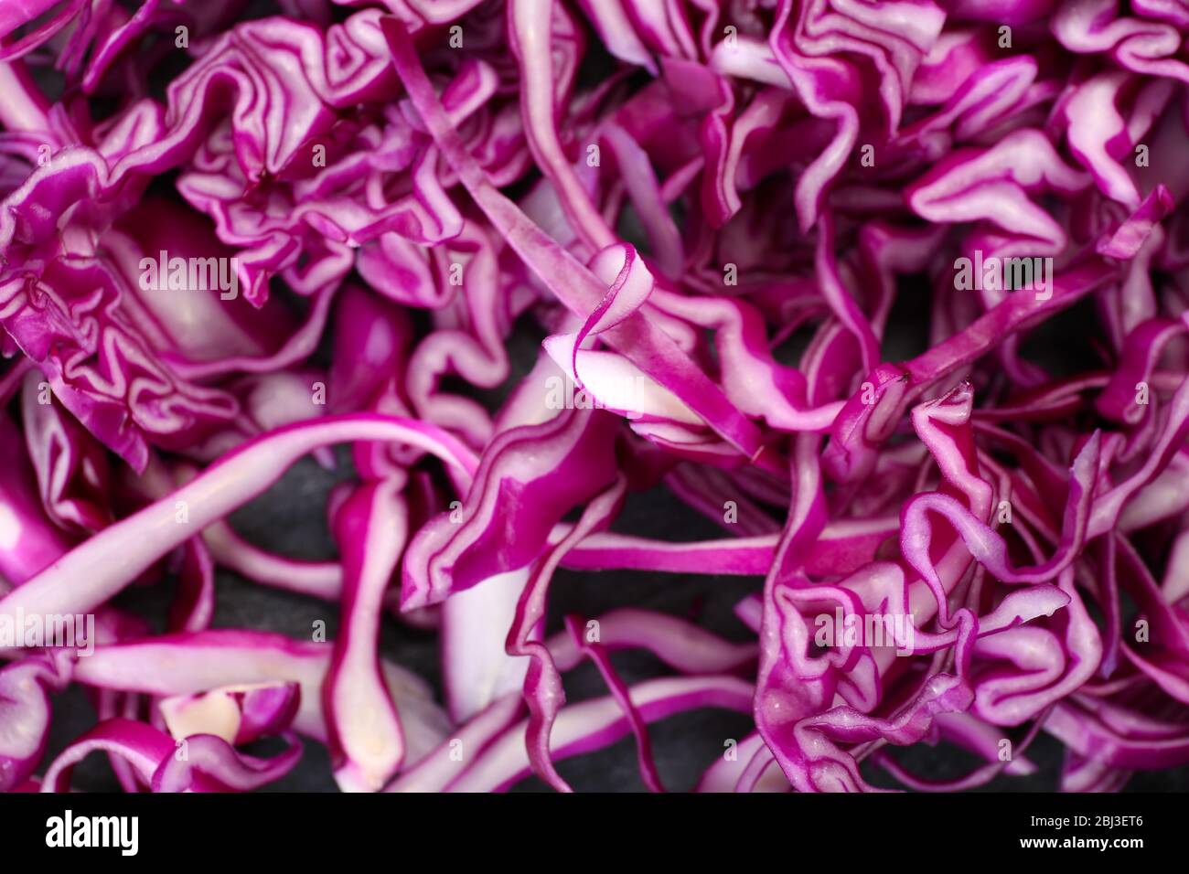 Cut red cabbage closeup Stock Photo - Alamy