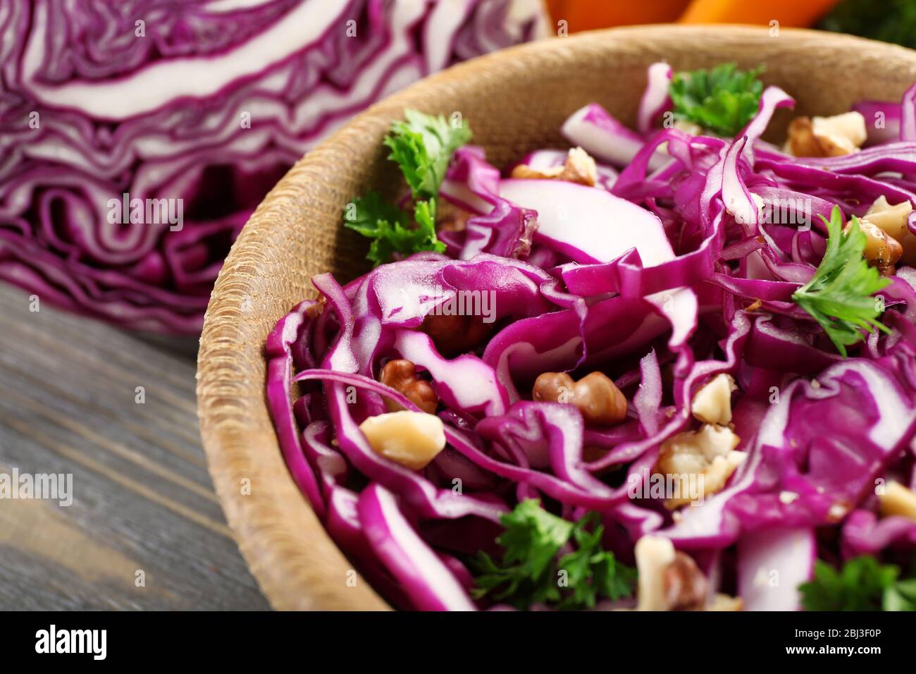Red cabbage salad served on plate closeup Stock Photo - Alamy