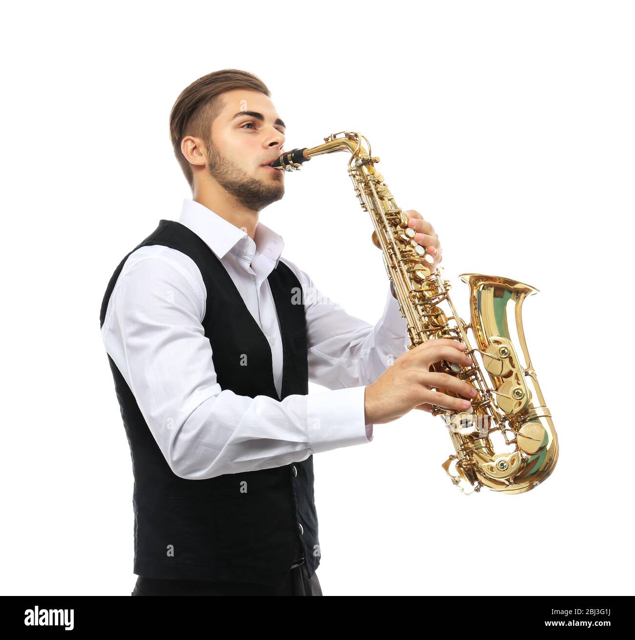 Happy saxophonist plays music on sax in elegant suit on white ...
