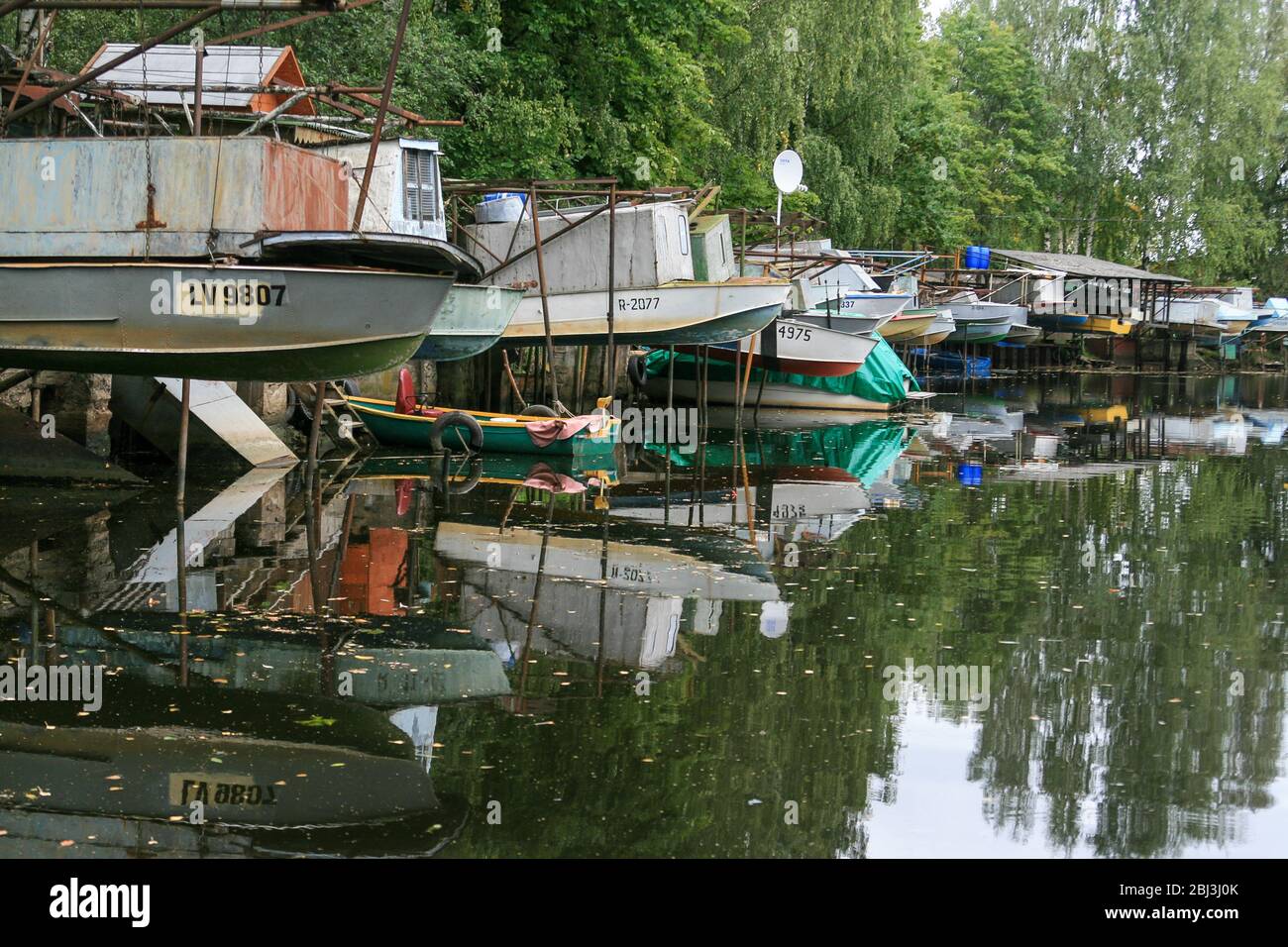 Old vintage rustic boats in a harbour Stock Photo - Alamy