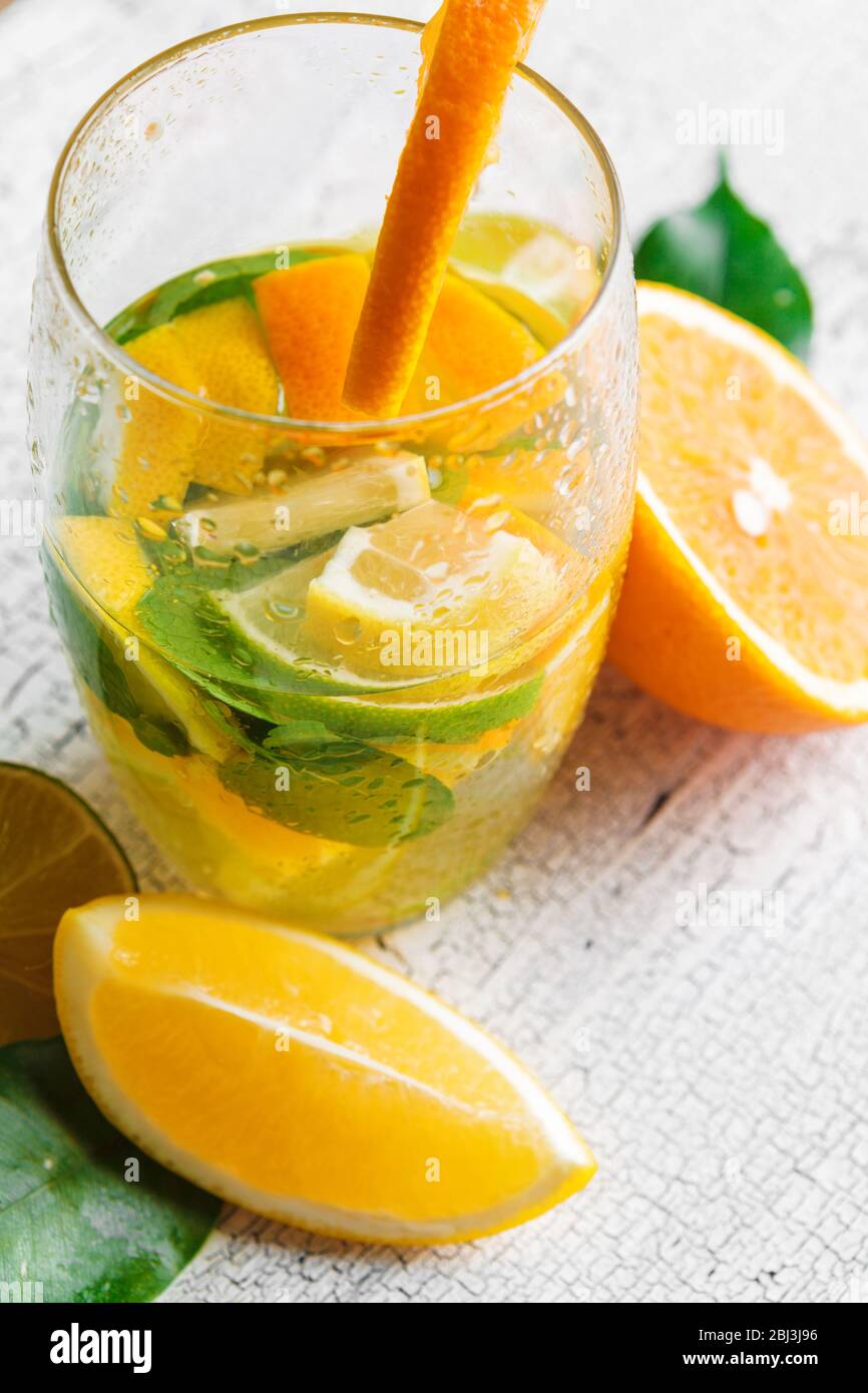 refreshing cold citrus water with mint. Close up Stock Photo - Alamy