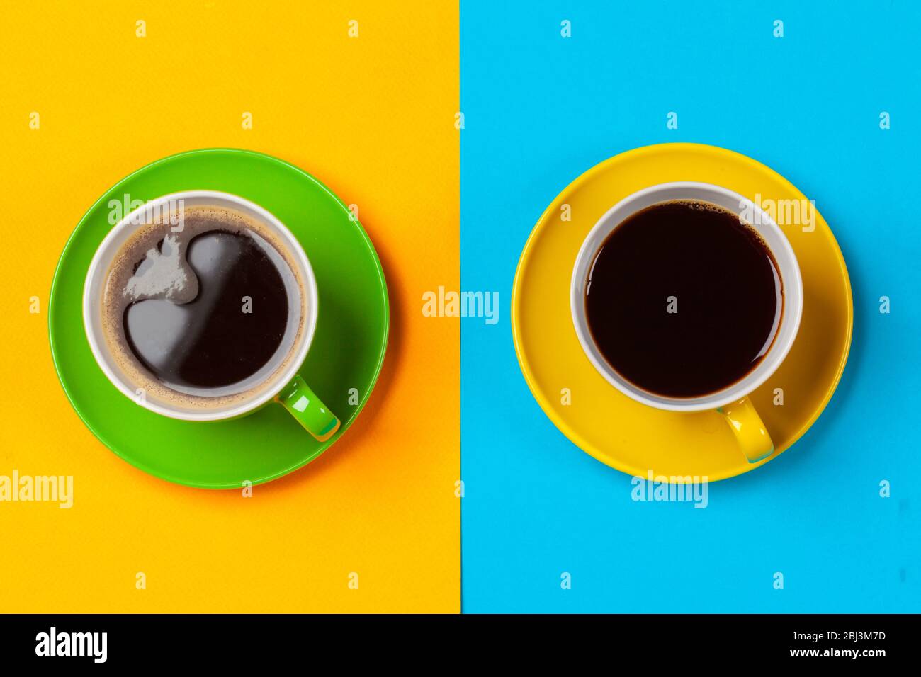 Colorful coffee cups and saucers on colorful vibrant background Stock ...