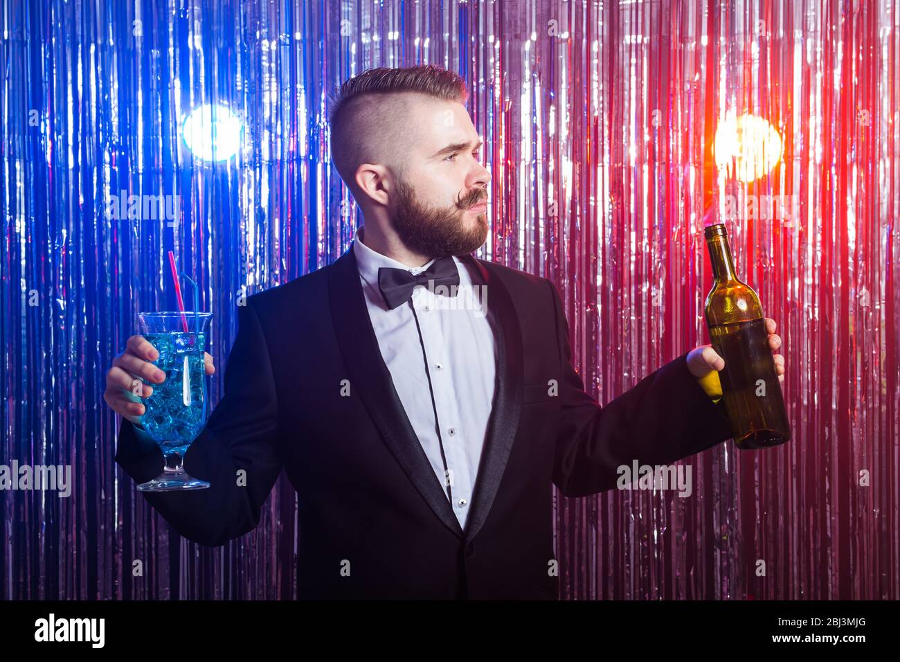 Alcoholism, fun and fool concept - Drunk man at party in a nightclub ...