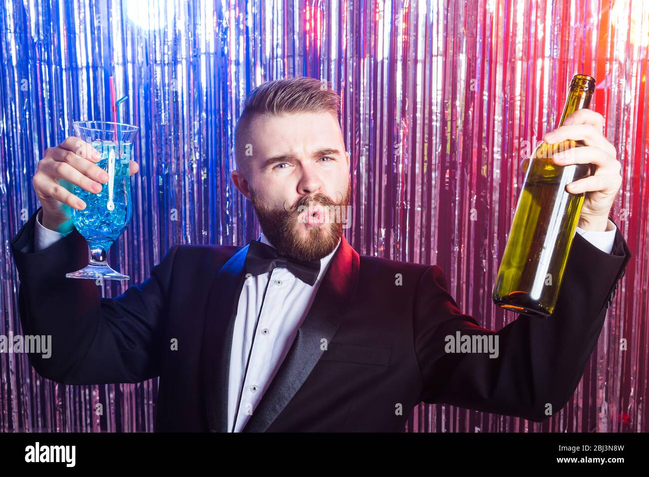 Alcoholism, fun and fool concept - Drunk man at party in a nightclub ...