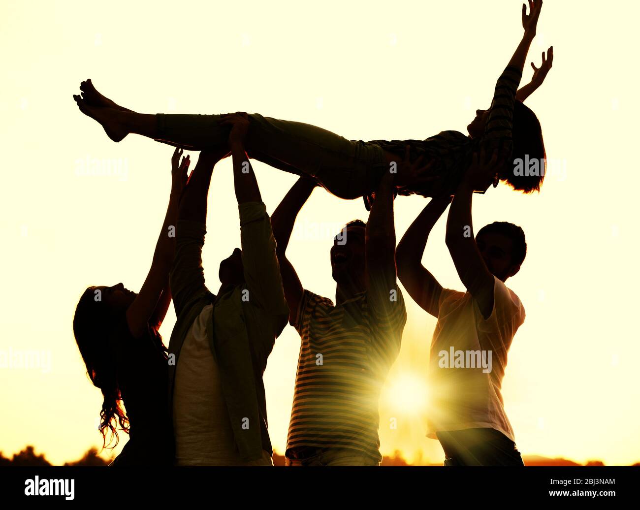 Young people on the riverside Stock Photo - Alamy