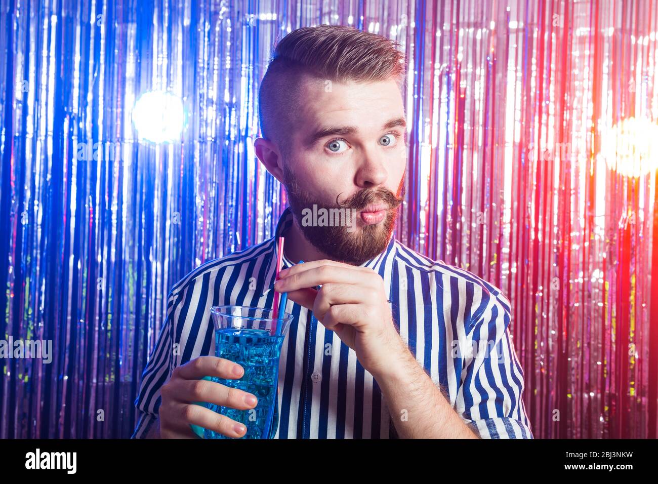 Alcoholism, fun and fool concept - Drunk guy at party in a nightclub ...