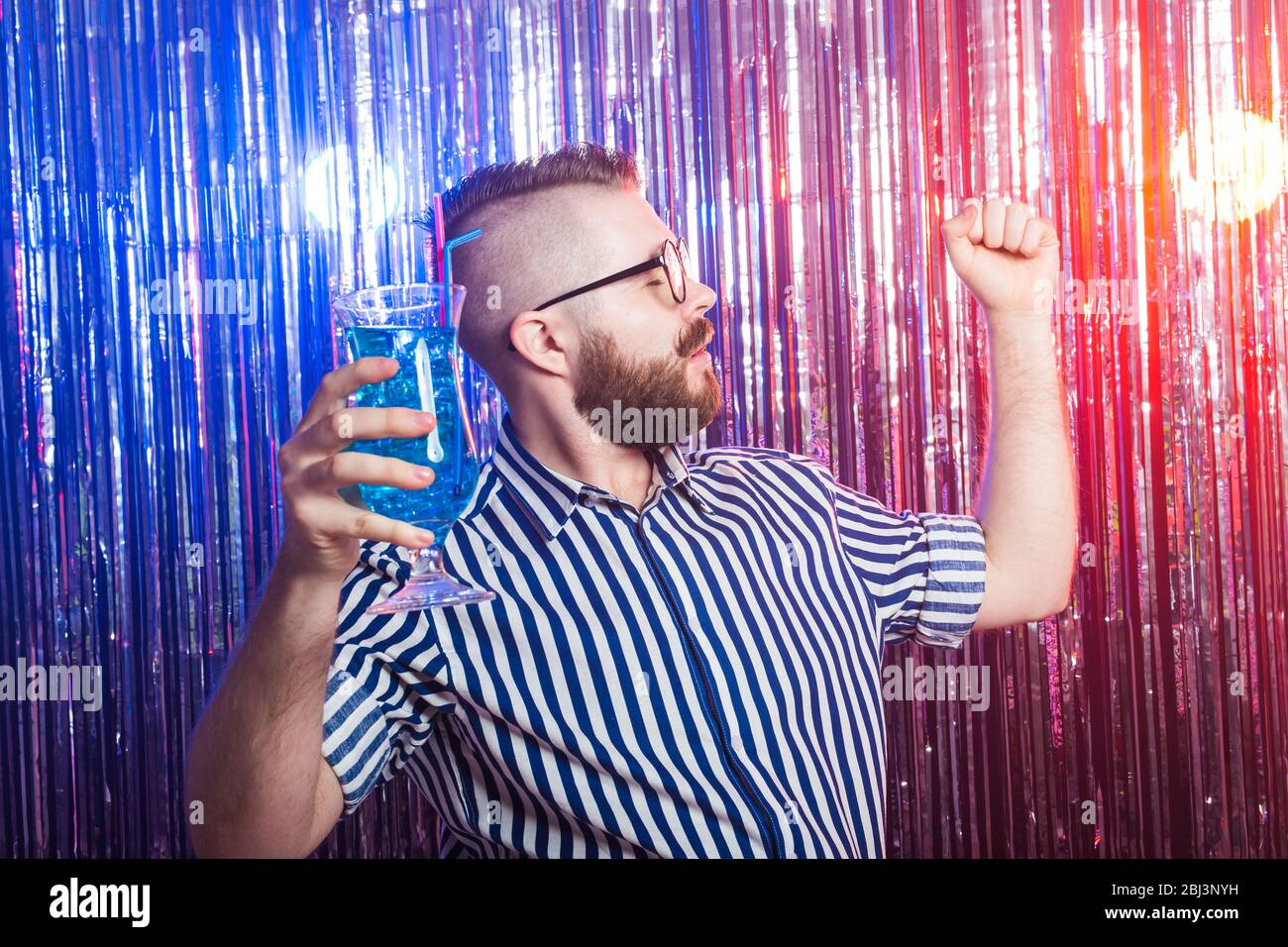 Alcoholism, fun and fool concept - Drunk crazy guy at party in a ...