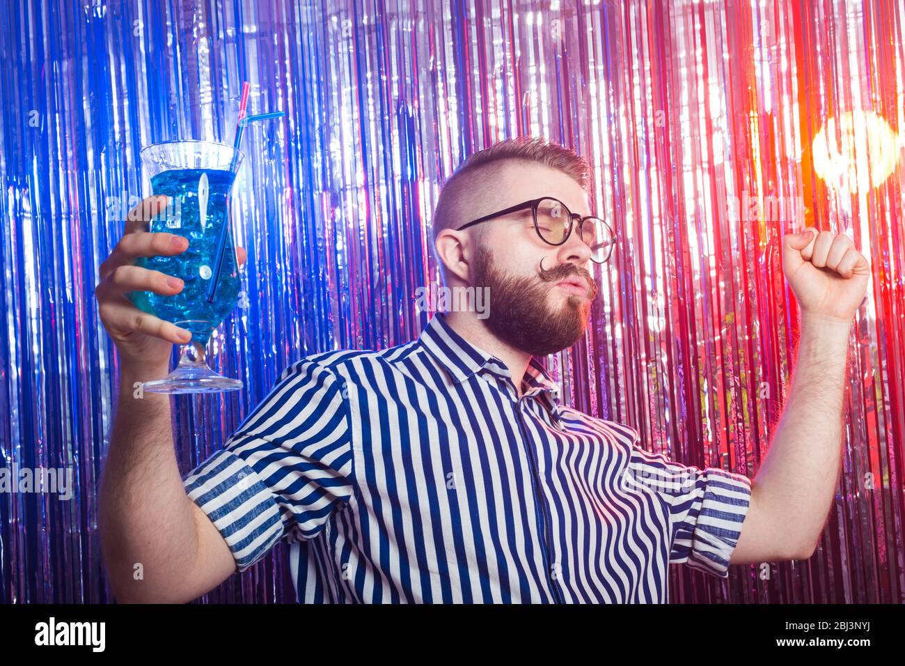 Alcoholism, fun and fool concept - Drunk crazy guy at party in a ...