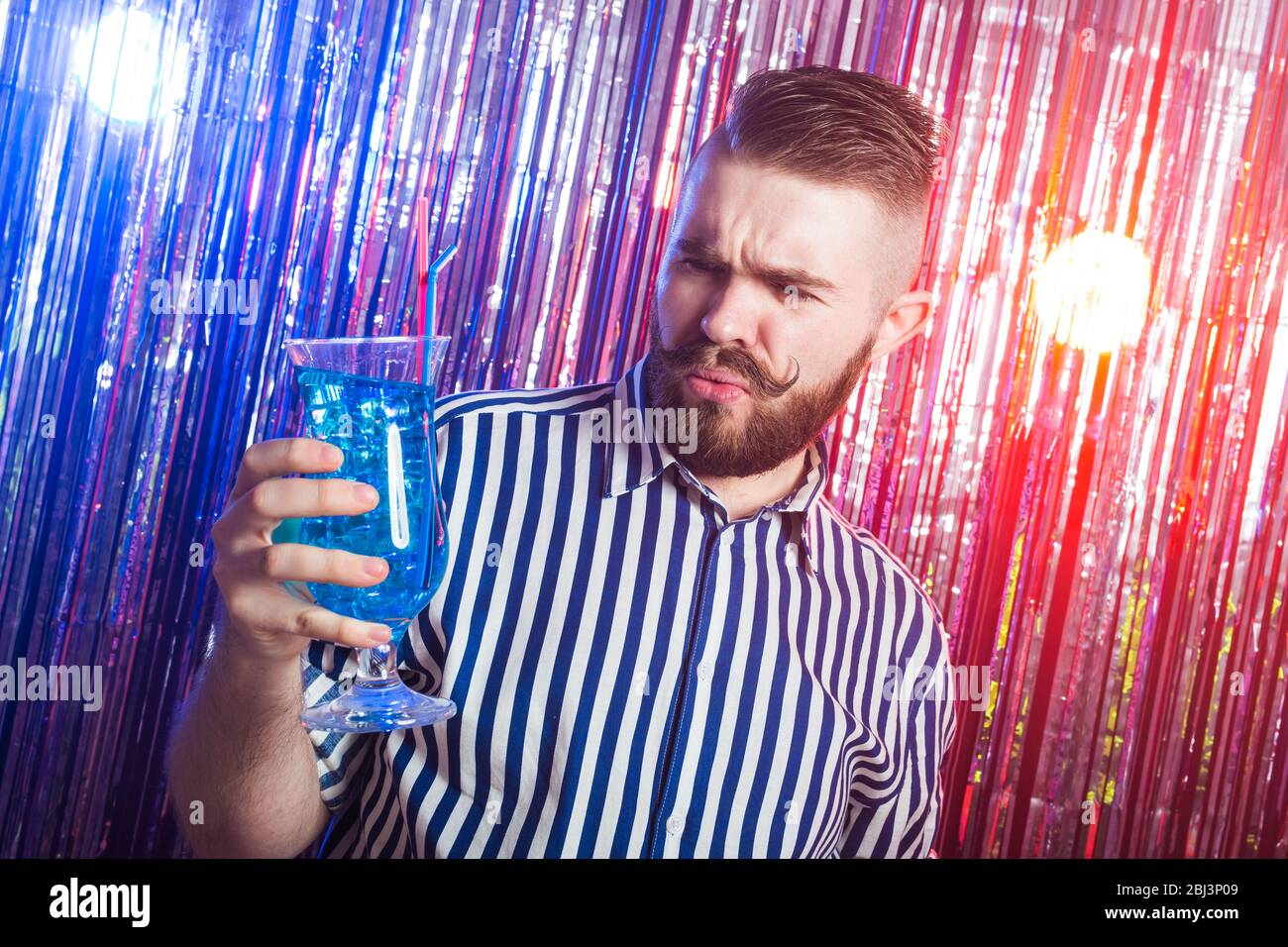 Alcoholism, fun and fool concept - Drunk crazy guy at party in a ...