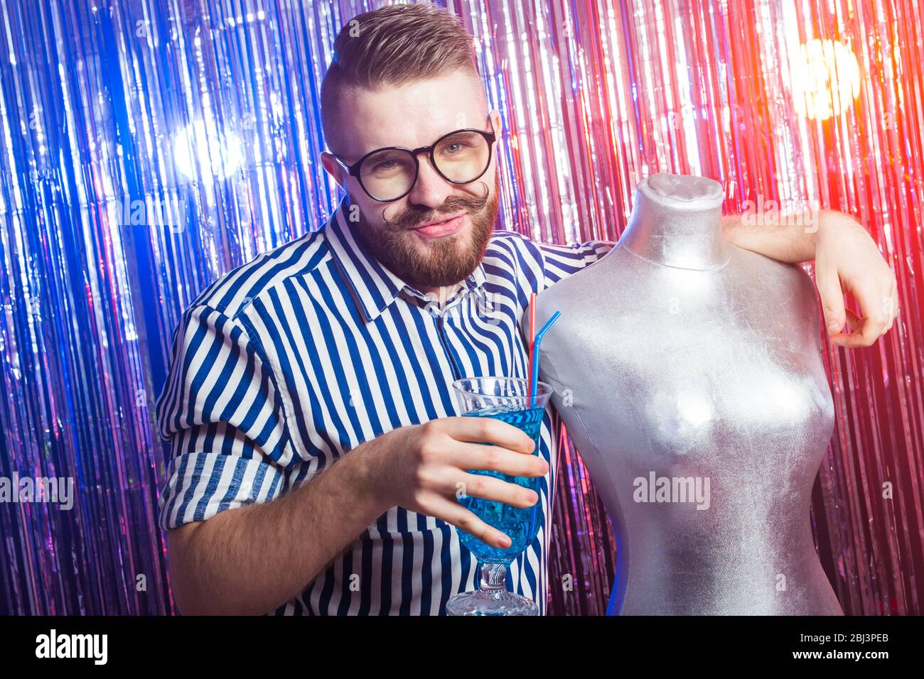 Alcoholism, fun and fool concept - Drunk guy at party in a nightclub ...