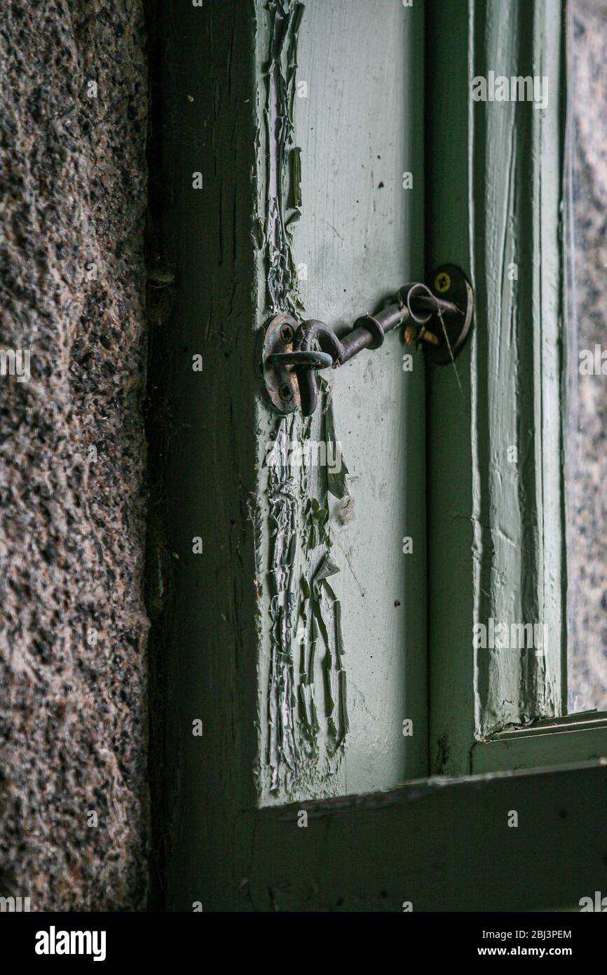 Old rustic vintage timber window lock Stock Photo - Alamy