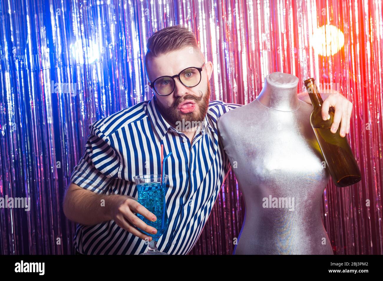 Alcoholism, fun and fool concept - Drunk crazy guy at party in a ...