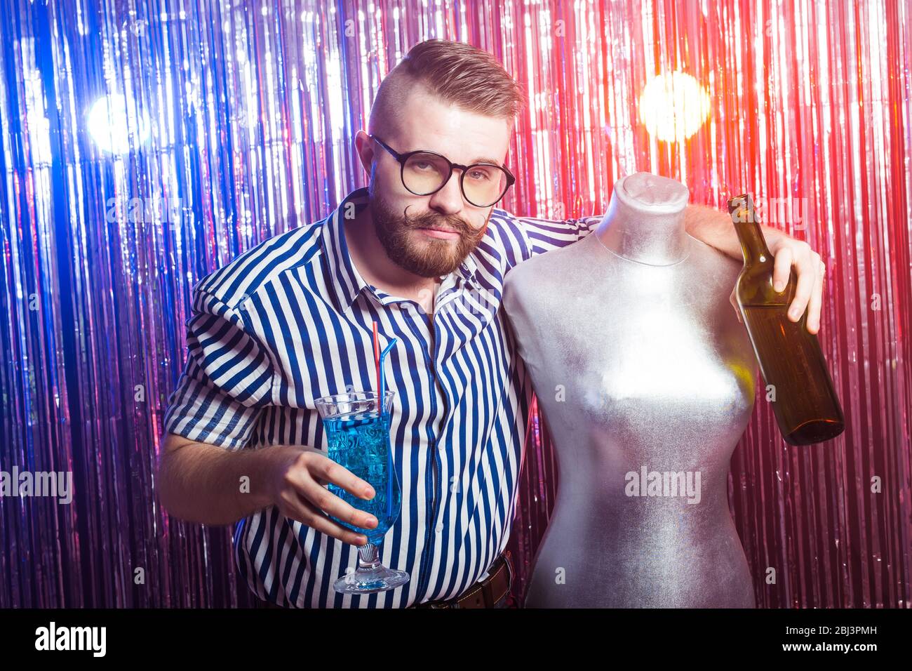 Alcoholism, fun and fool concept - Drunk crazy guy at party in a ...