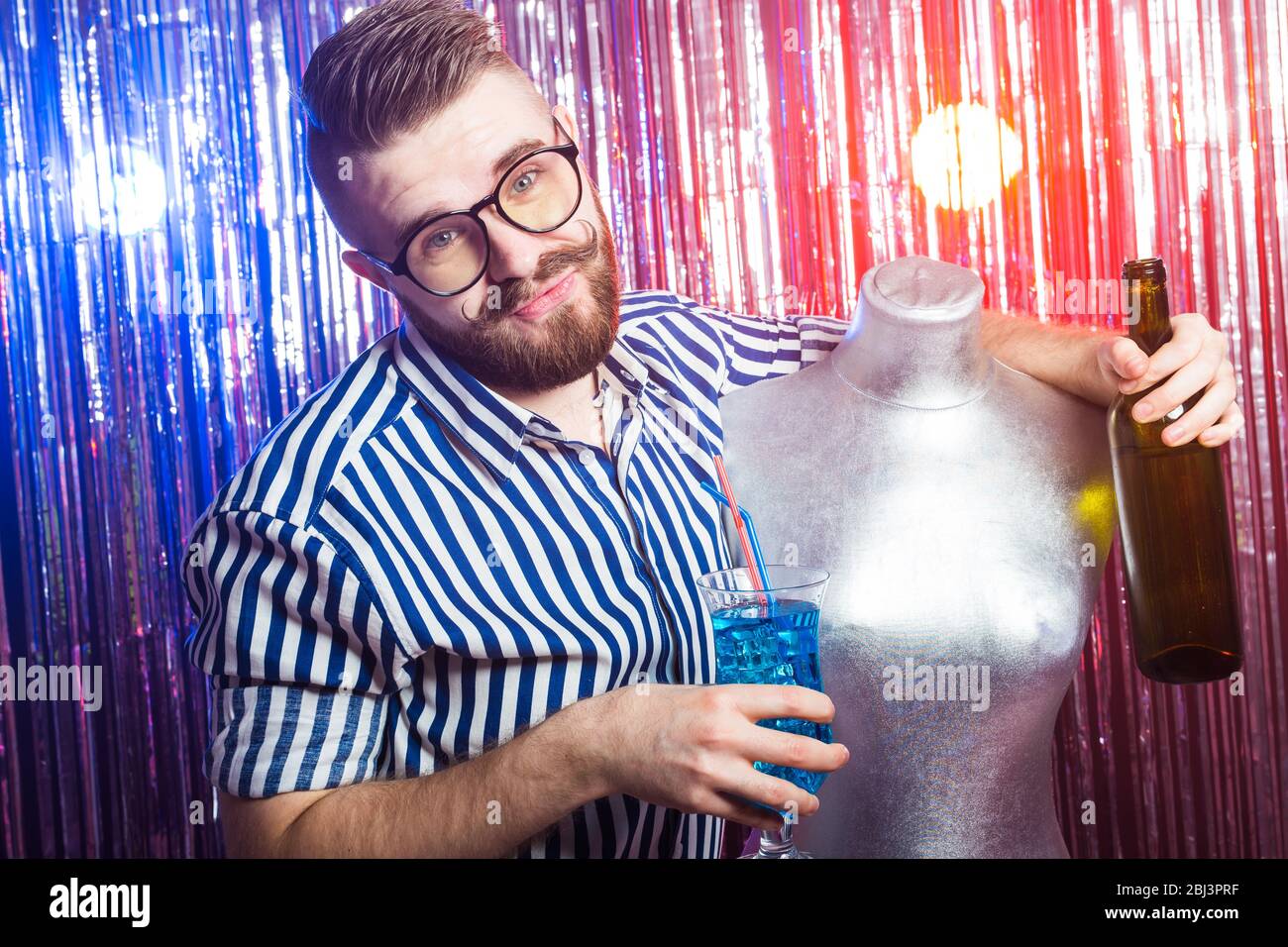 Alcoholism, fun and fool concept - Drunk crazy guy at party in a ...