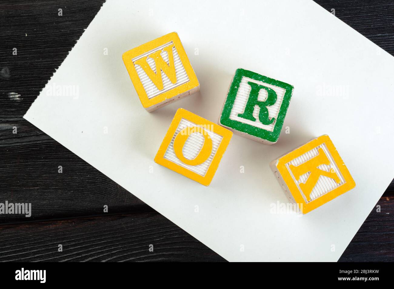 work cube with letters, sign with wooden cubes Stock Photo - Alamy