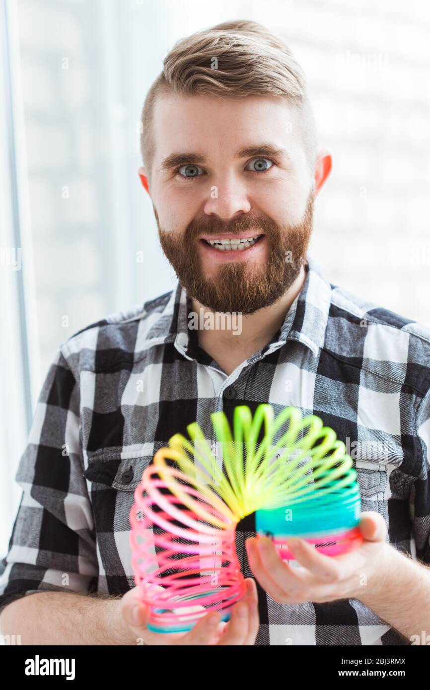 Plastic slinky toy spring stretch hi-res stock photography and images ...