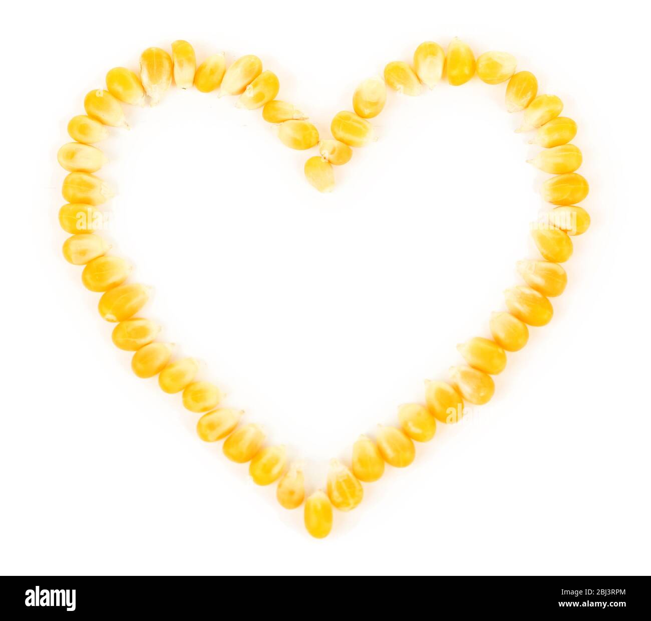 Heart shaped corn beans isolated on white Stock Photo - Alamy