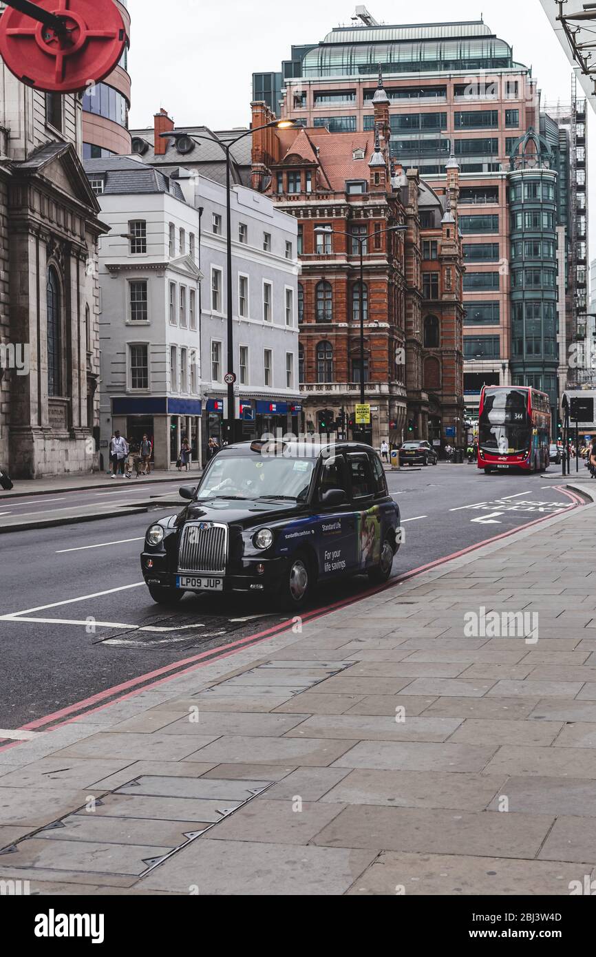 London/UK-22/07/18: Black cab waiting on traffic light on Bishopsgate ...
