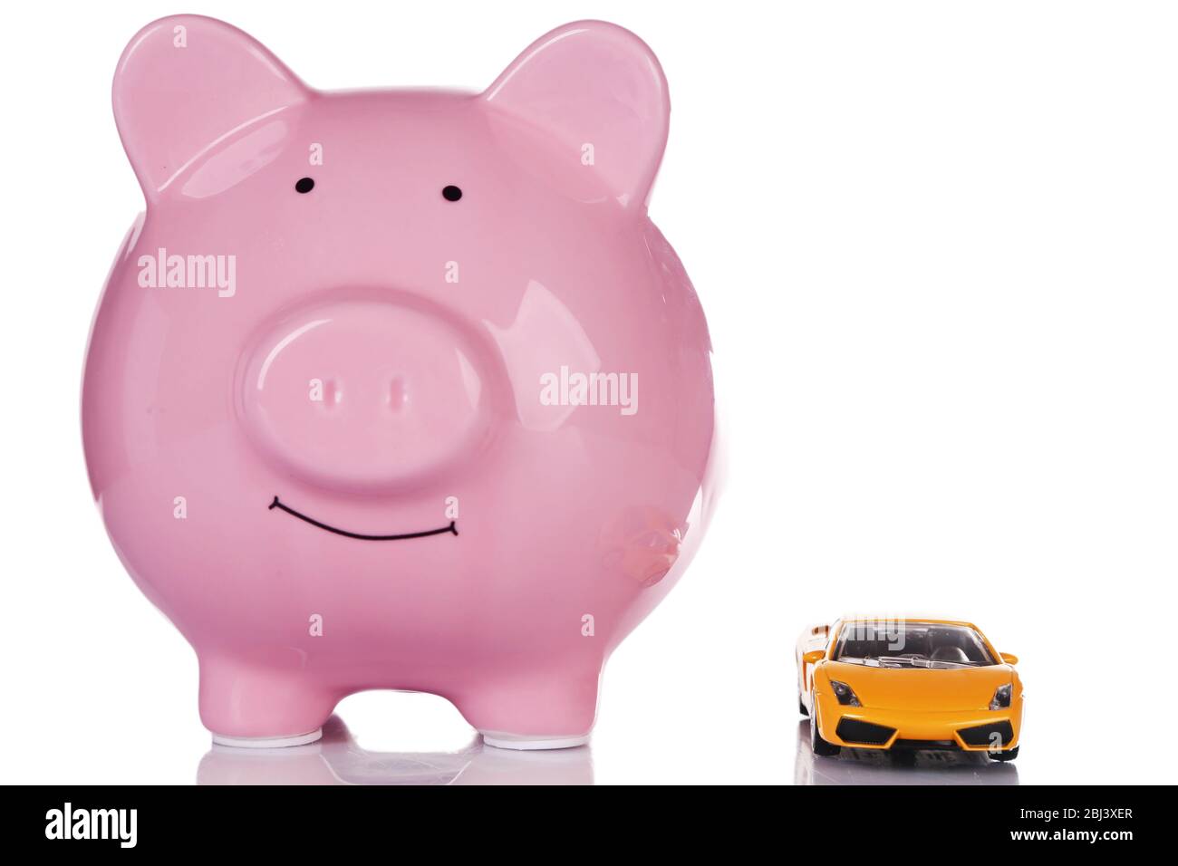 Pig moneybox and toy car isolated on white Stock Photo - Alamy