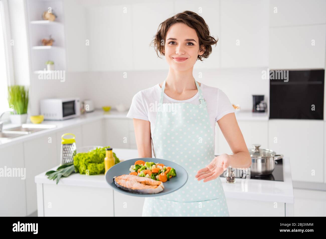 Have your gastronomy masterpiece, Photo of housewife lady chef showing ...