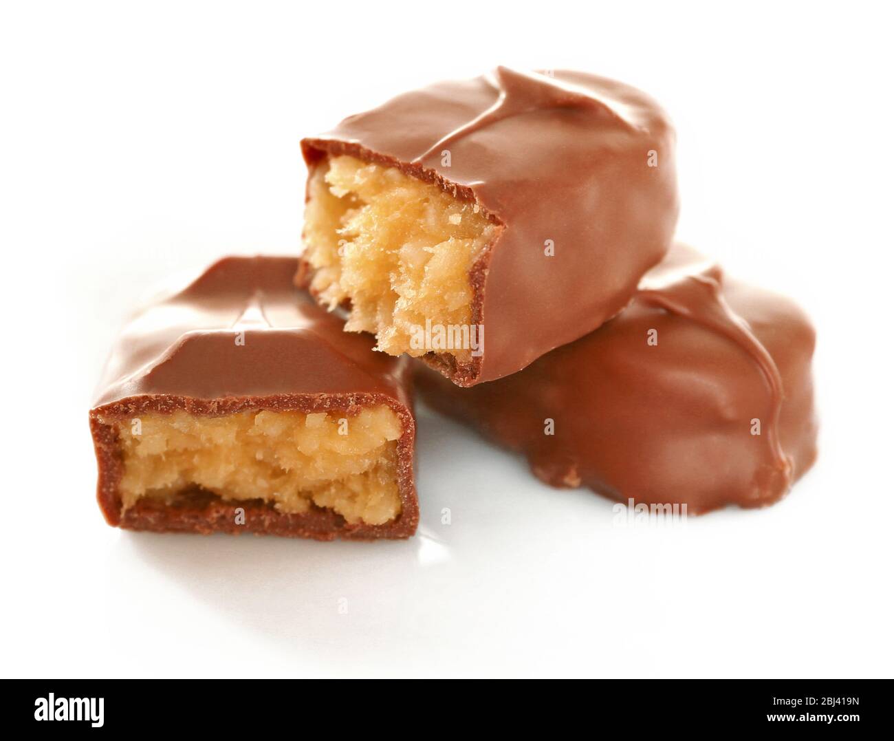 Tasty broken chocolate bars isolated on white background Stock Photo ...