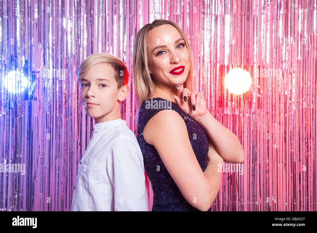 Mothers day, children and family concept - teen boy and his mom ...