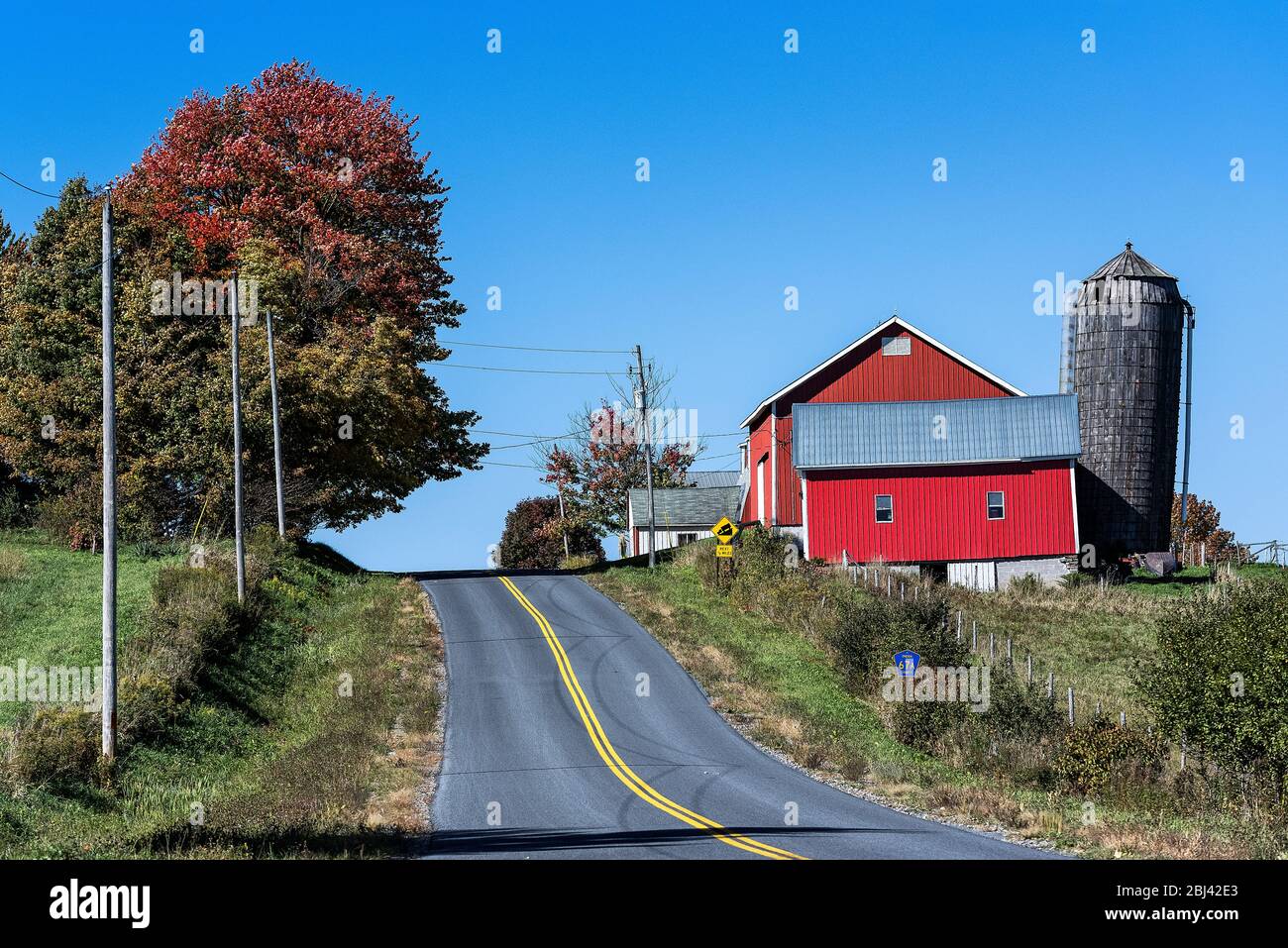 Country road and red barn in upstate New York Stock Photo - Alamy
