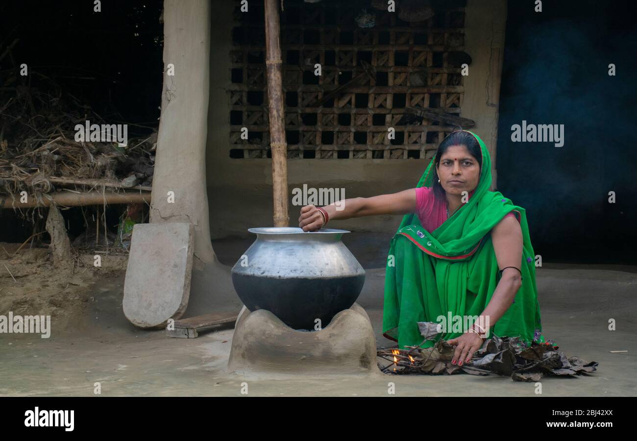Indian village woman cooking hi-res stock photography and images - Alamy