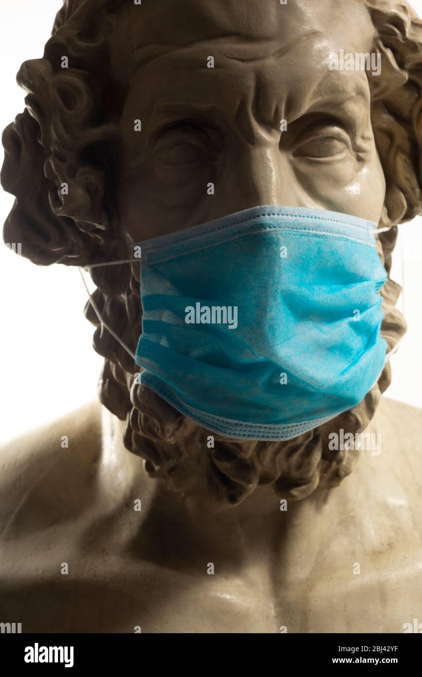 Gypsum Copy of Ancient Statue Homer Wearing Virus Face Mask Stock Photo ...