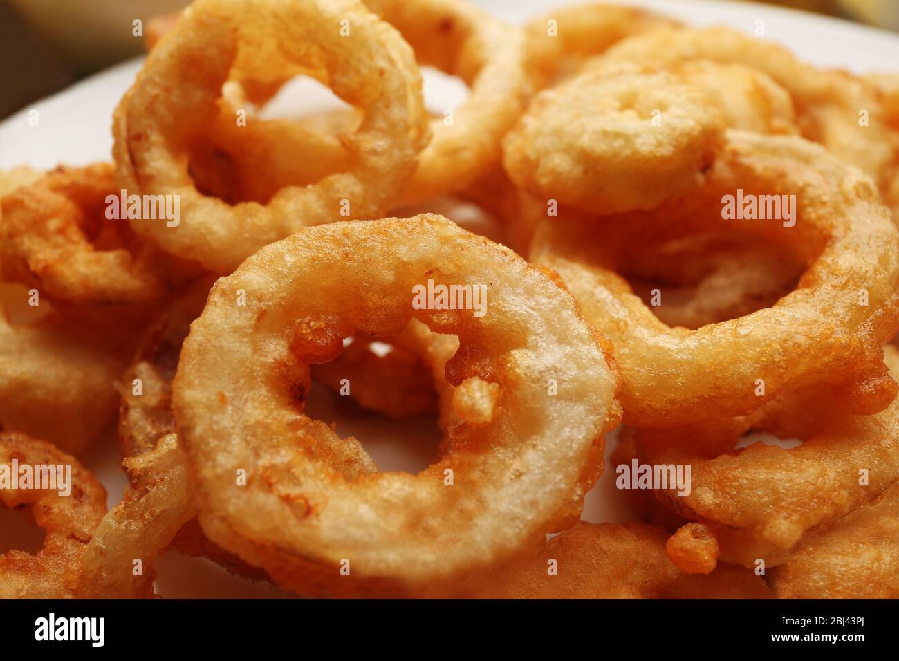 Chips rings with sauce on plate Stock Photo - Alamy