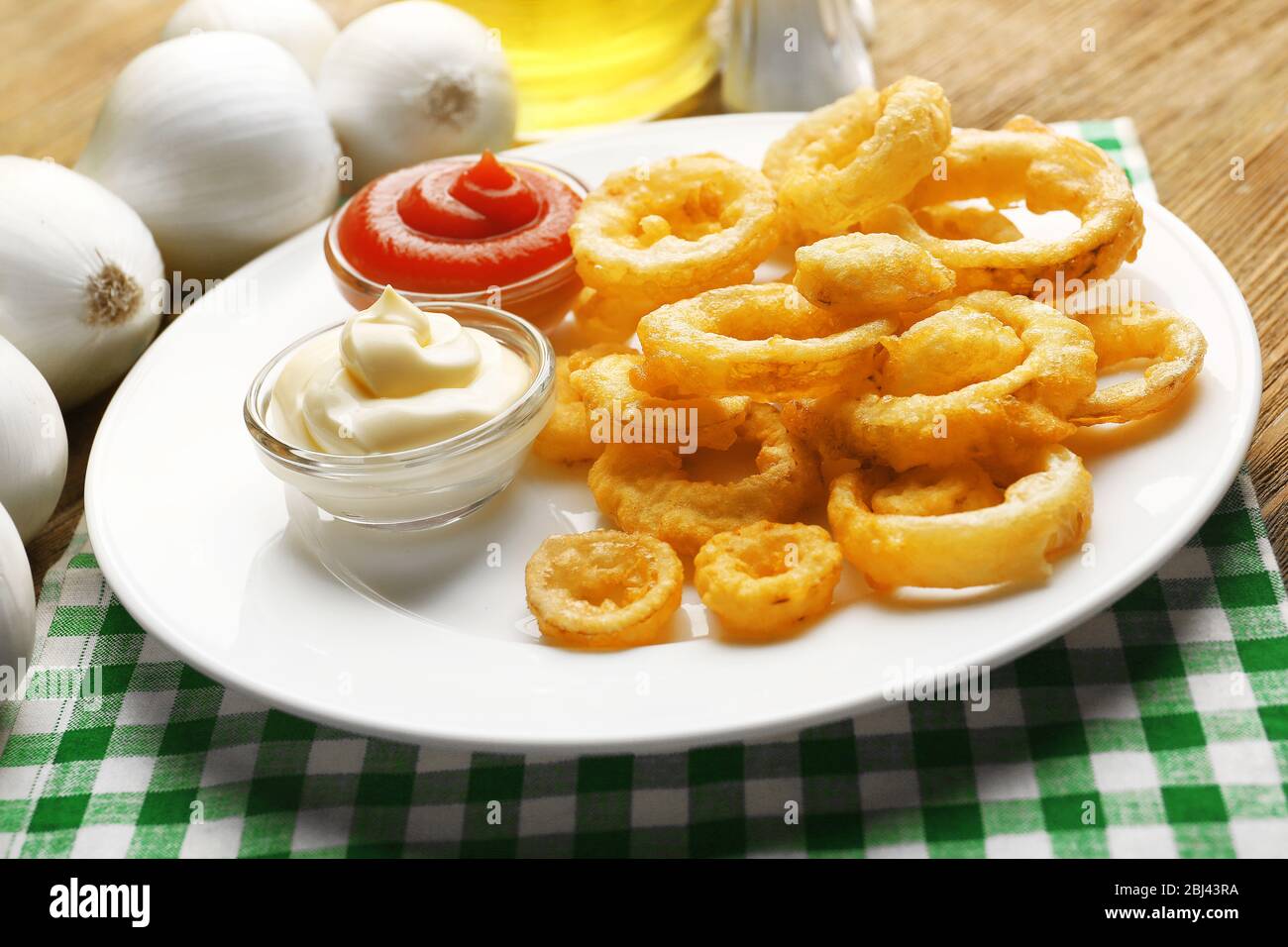 Chips rings with sauce and onion Stock Photo - Alamy