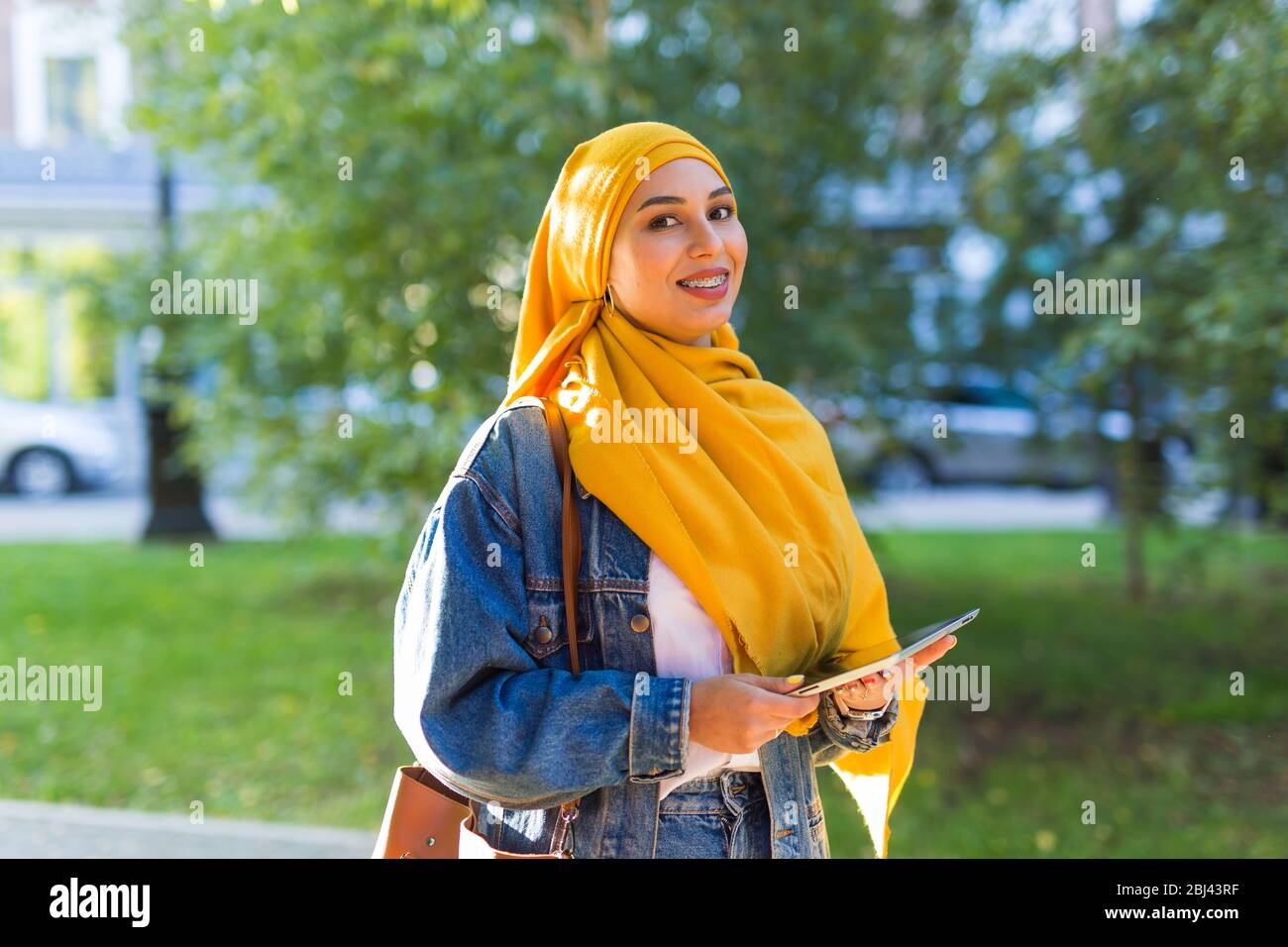 Arab woman student. Beautiful muslim female student wearing bright ...