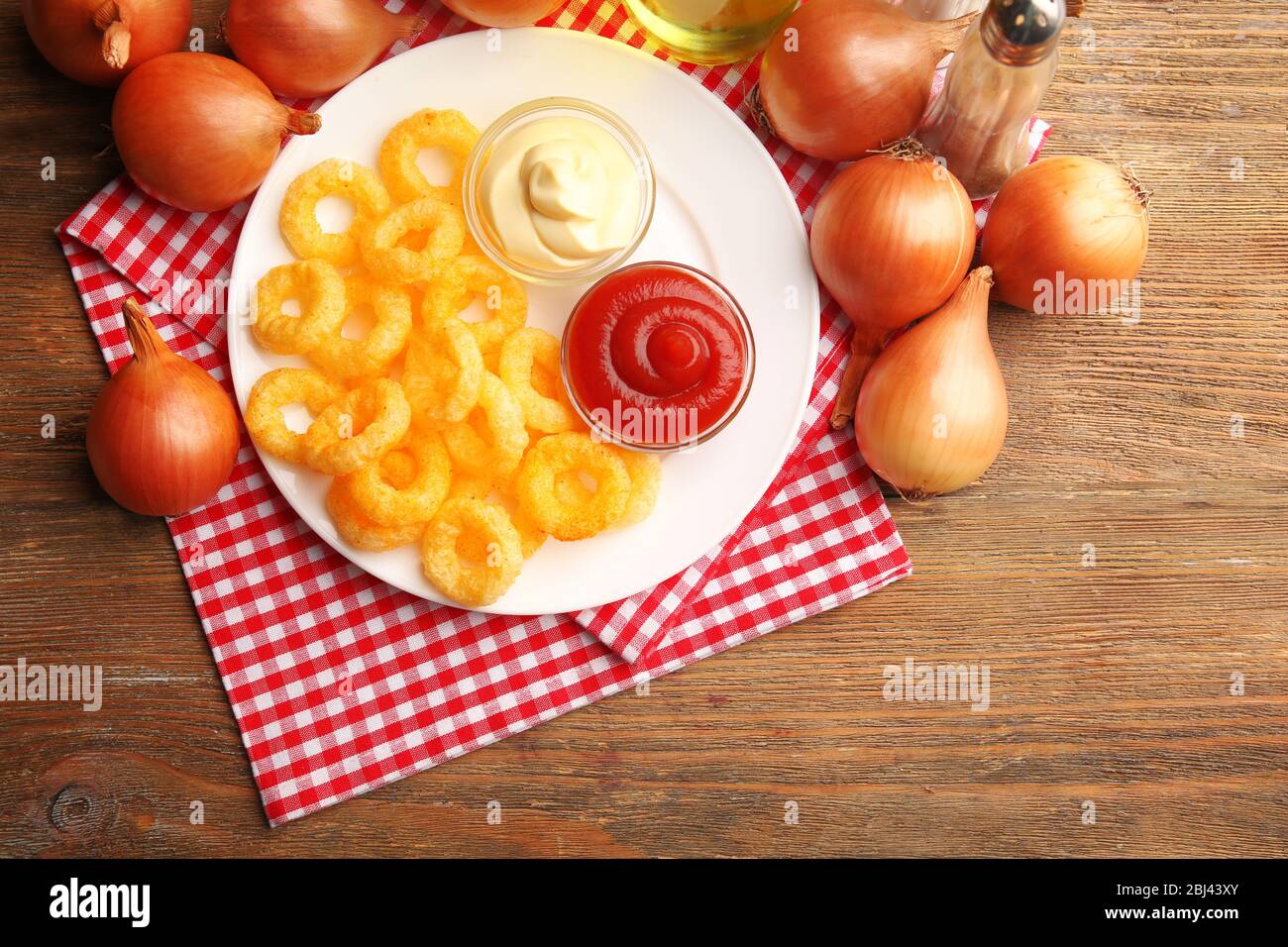 Chips rings with sauce and onion Stock Photo - Alamy