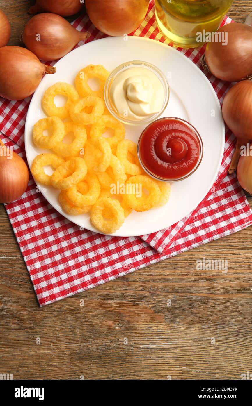 Chips rings with sauce and onion Stock Photo - Alamy