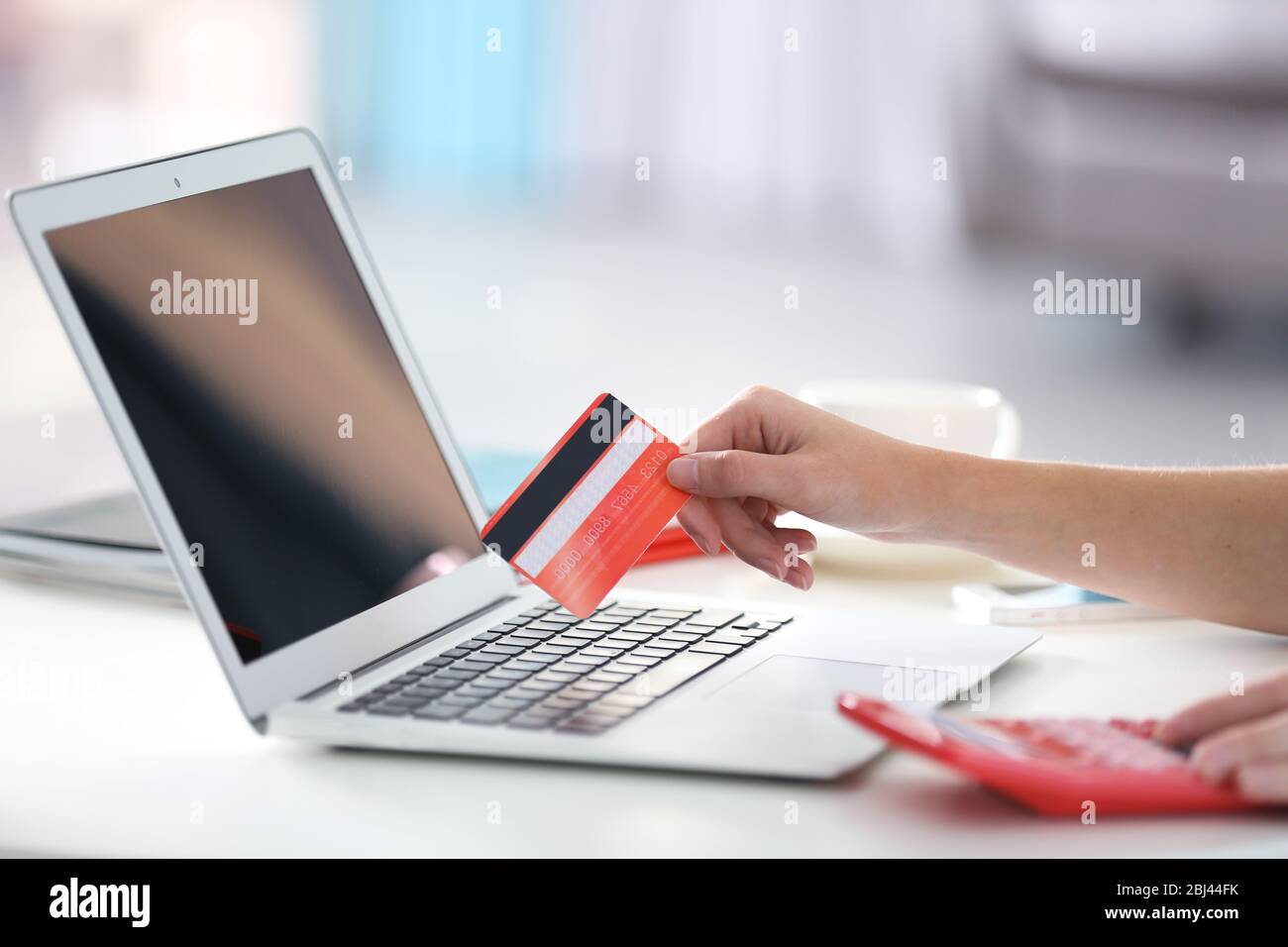 Female making online payment, close up Stock Photo - Alamy