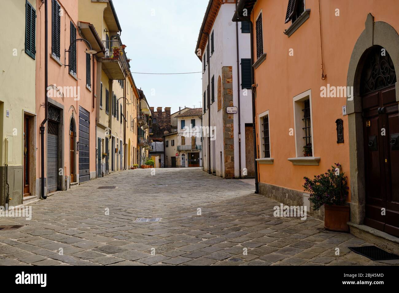 Main street of little town Porcari. Solo Backpacker Trekking on the Via ...
