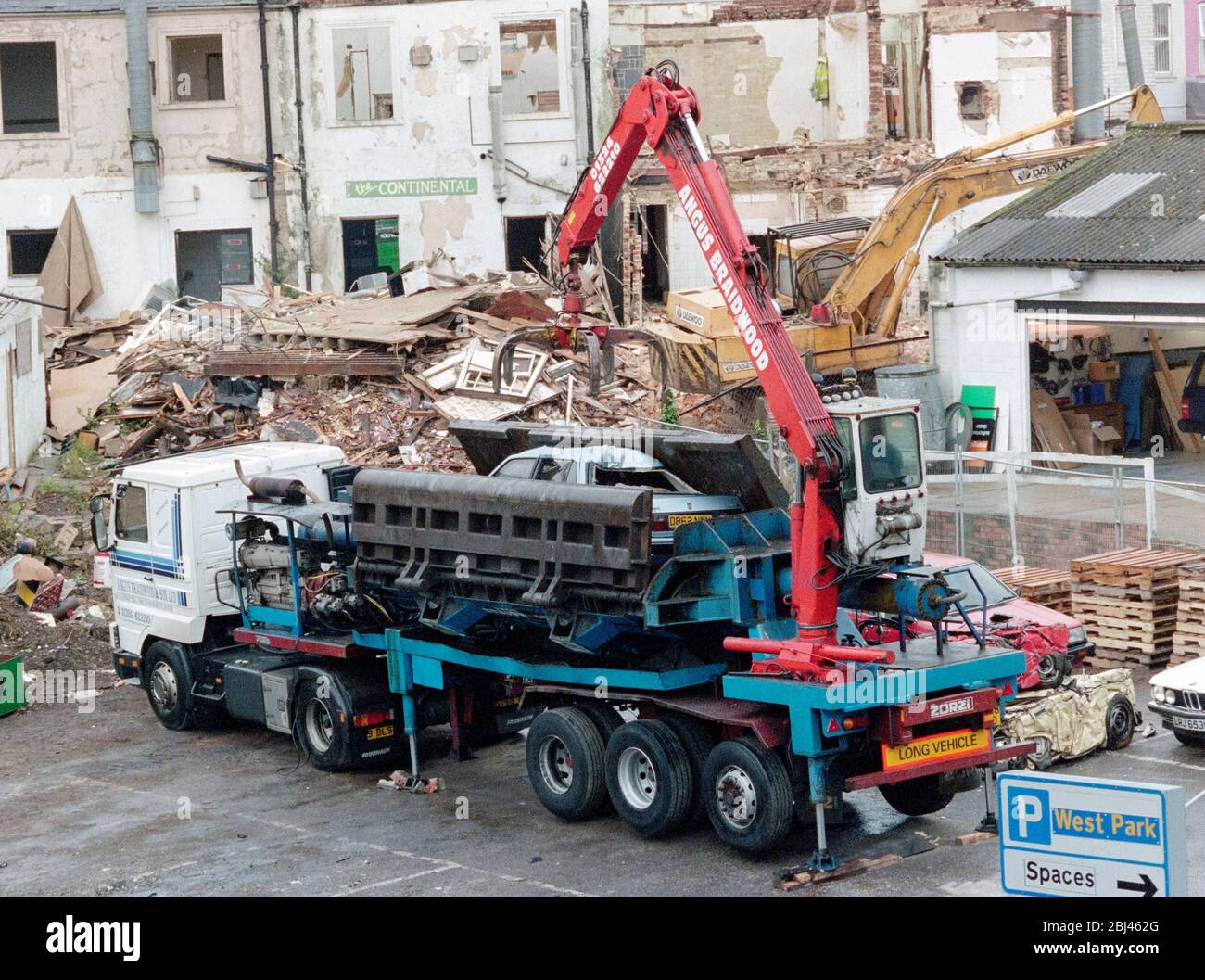 A mobile car crusher at work in Southampton where police and DVLA ...